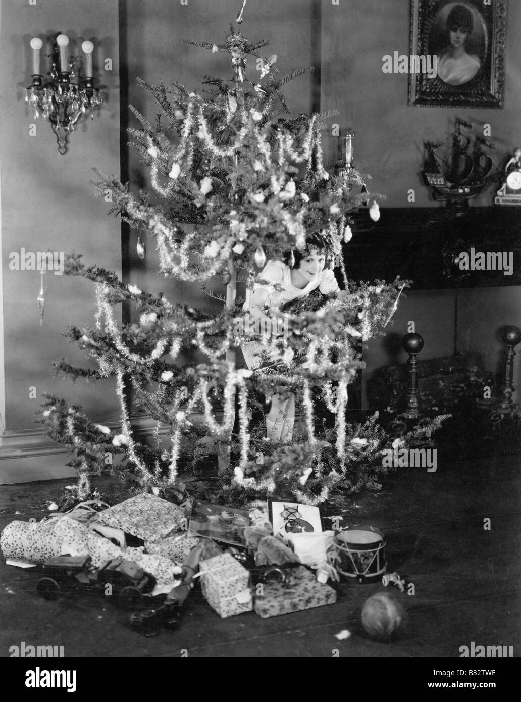Christmas tree woman holiday Black and White Stock Photos & Images - Alamy