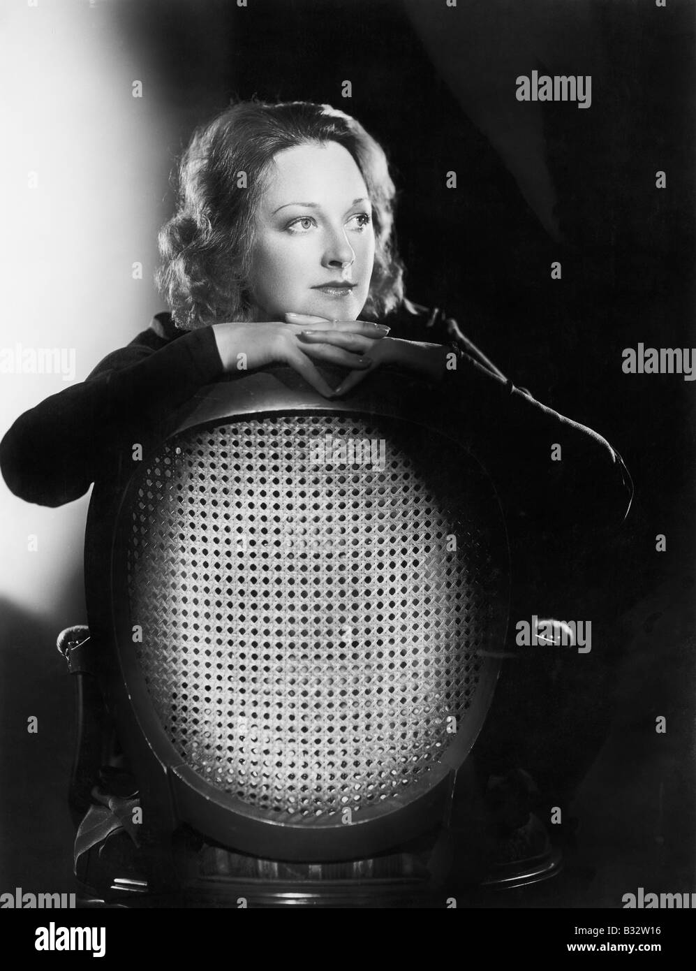 Sitting over chair Black and White Stock Photos & Images - Alamy