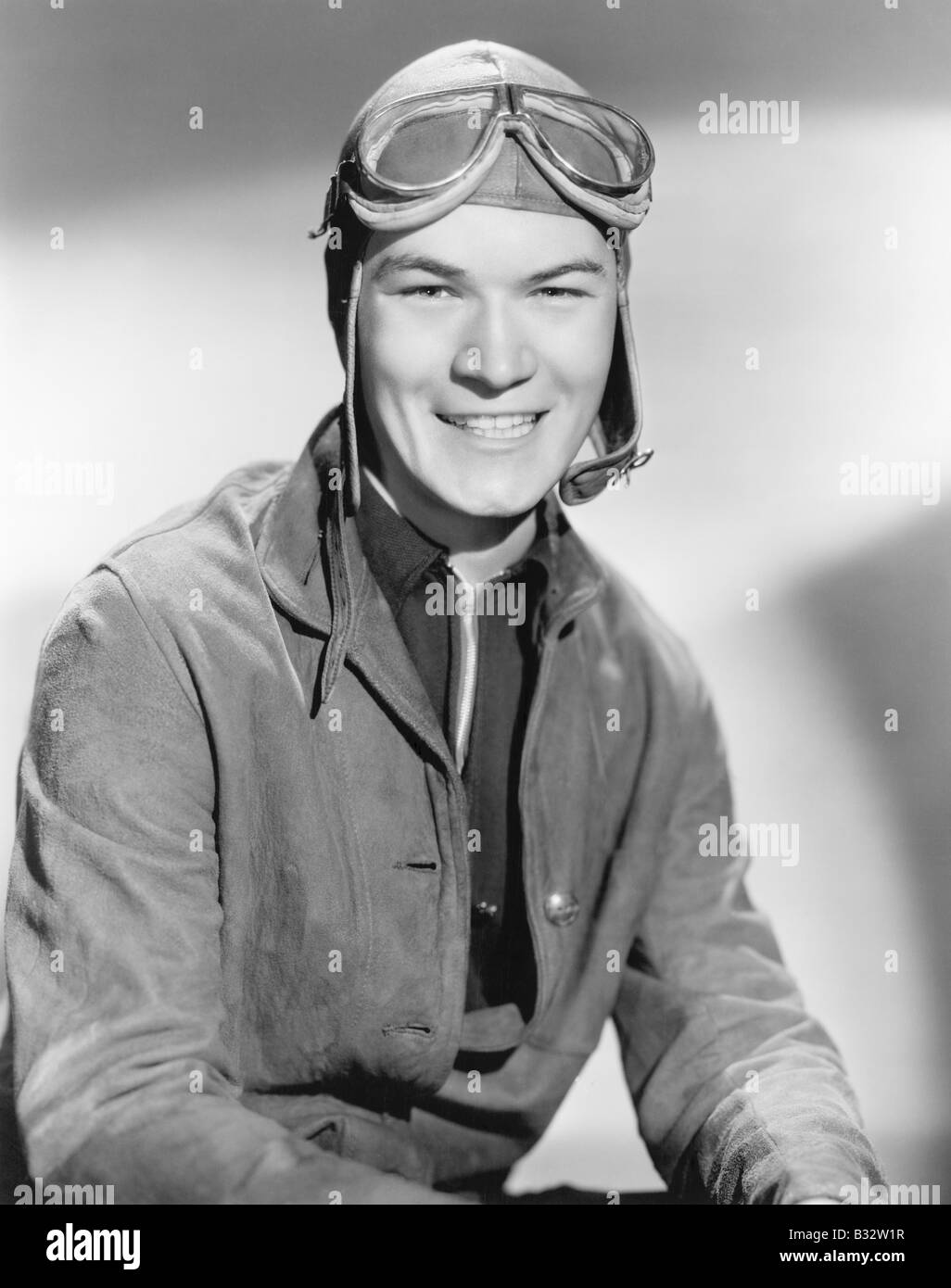 Portrait young happy man making Black and White Stock Photos & Images ...