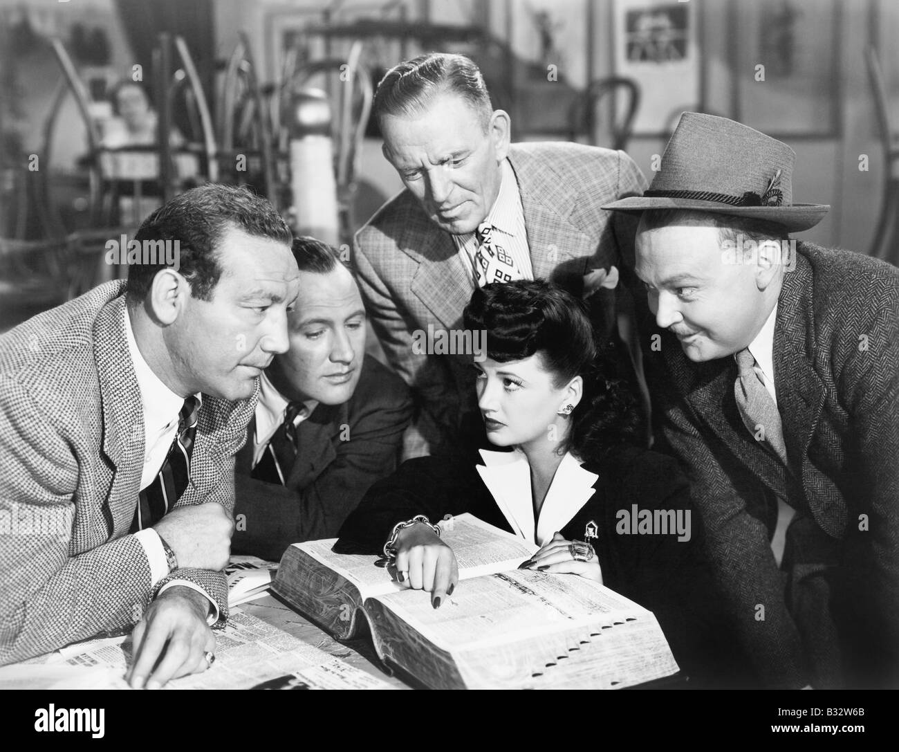 Man searching books Black and White Stock Photos & Images - Alamy