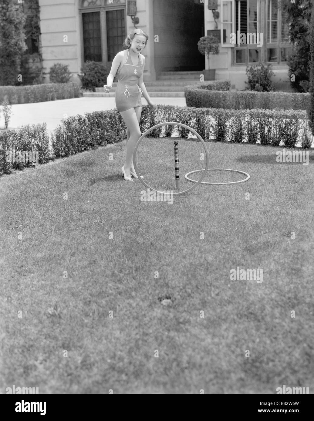 Playing in sun Black and White Stock Photos & Images - Alamy