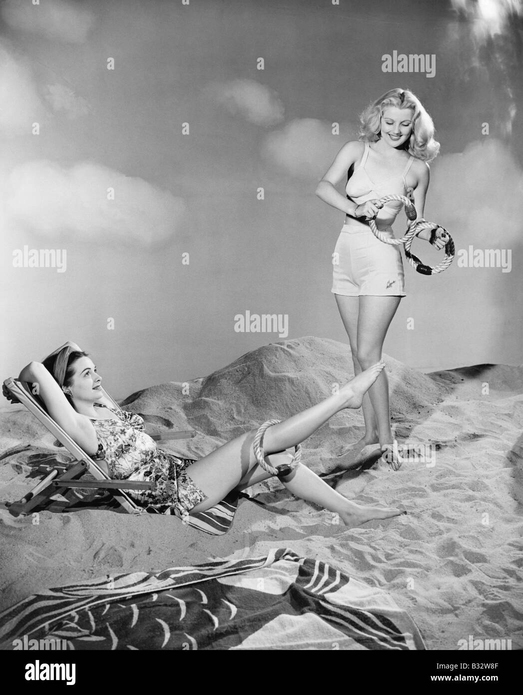 On beach women in sun Black and White Stock Photos & Images - Alamy