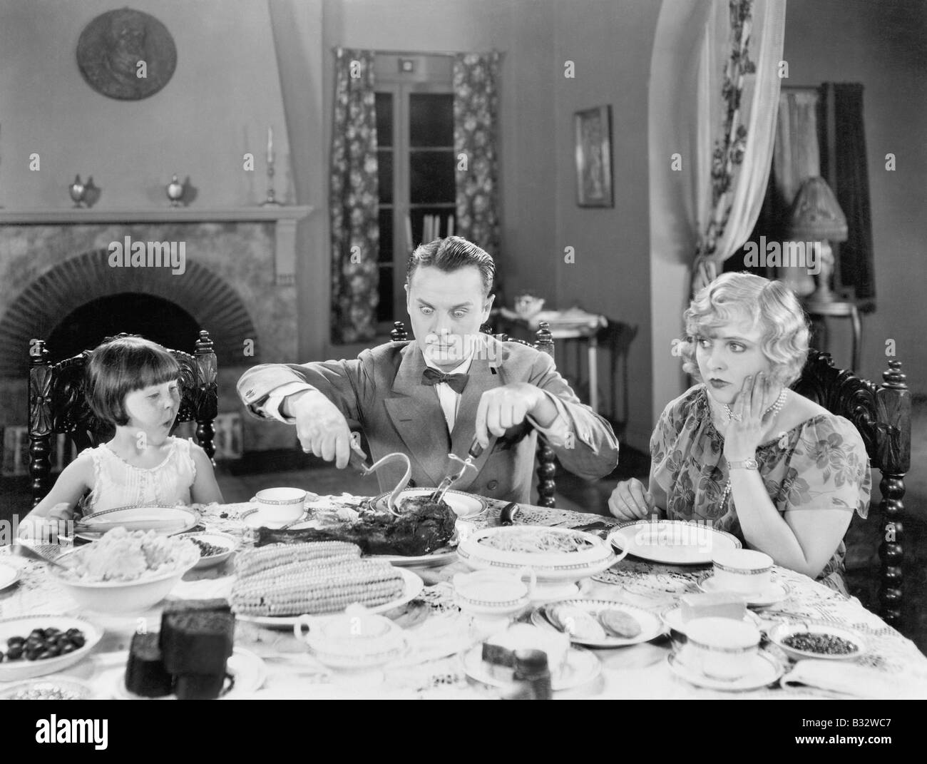 Family dining table Black and White Stock Photos & Images - Alamy