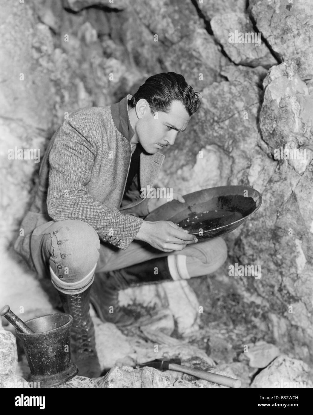 Gold panning Black and White Stock Photos & Images - Alamy