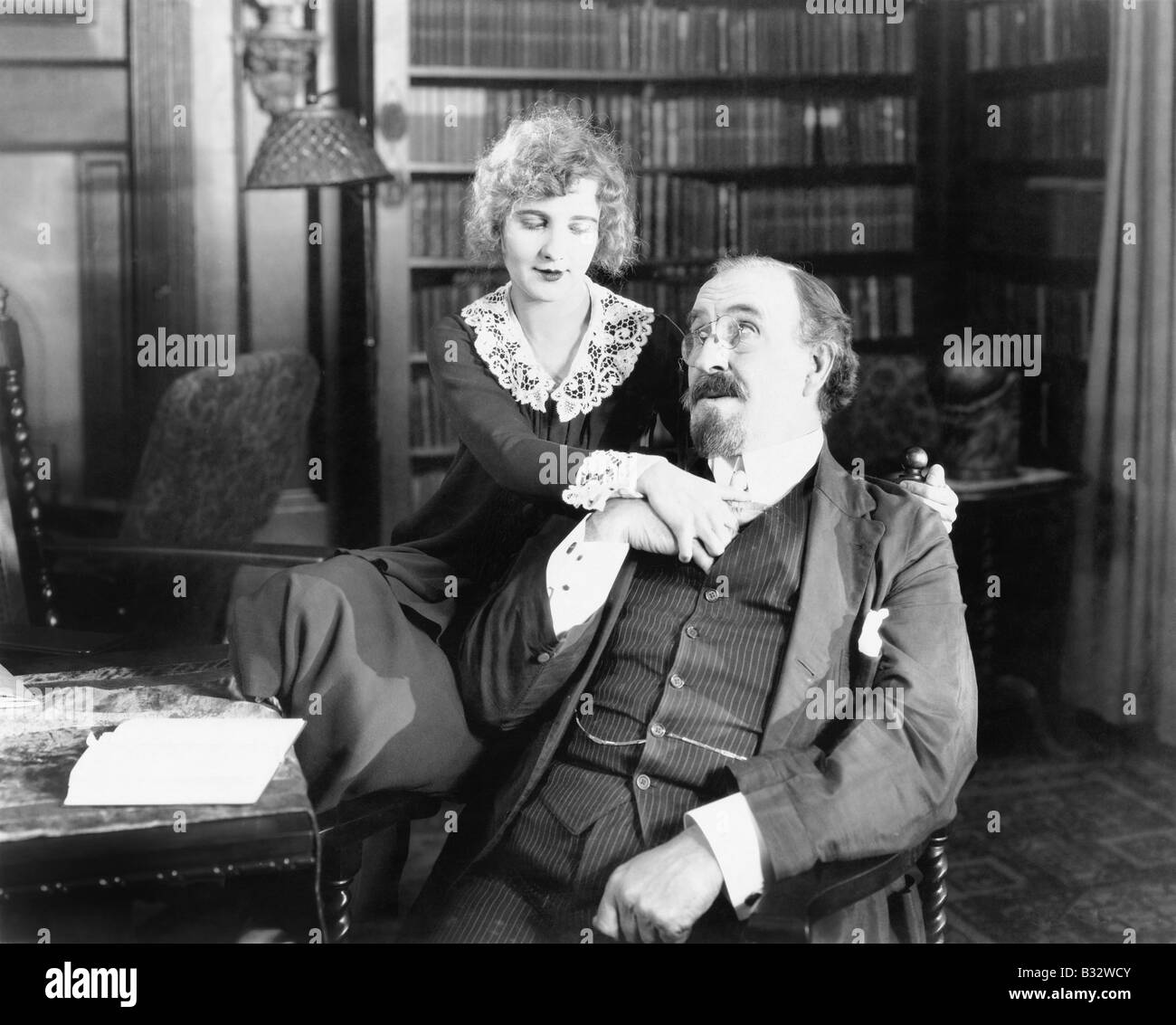Man in chair hands Black and White Stock Photos & Images - Alamy
