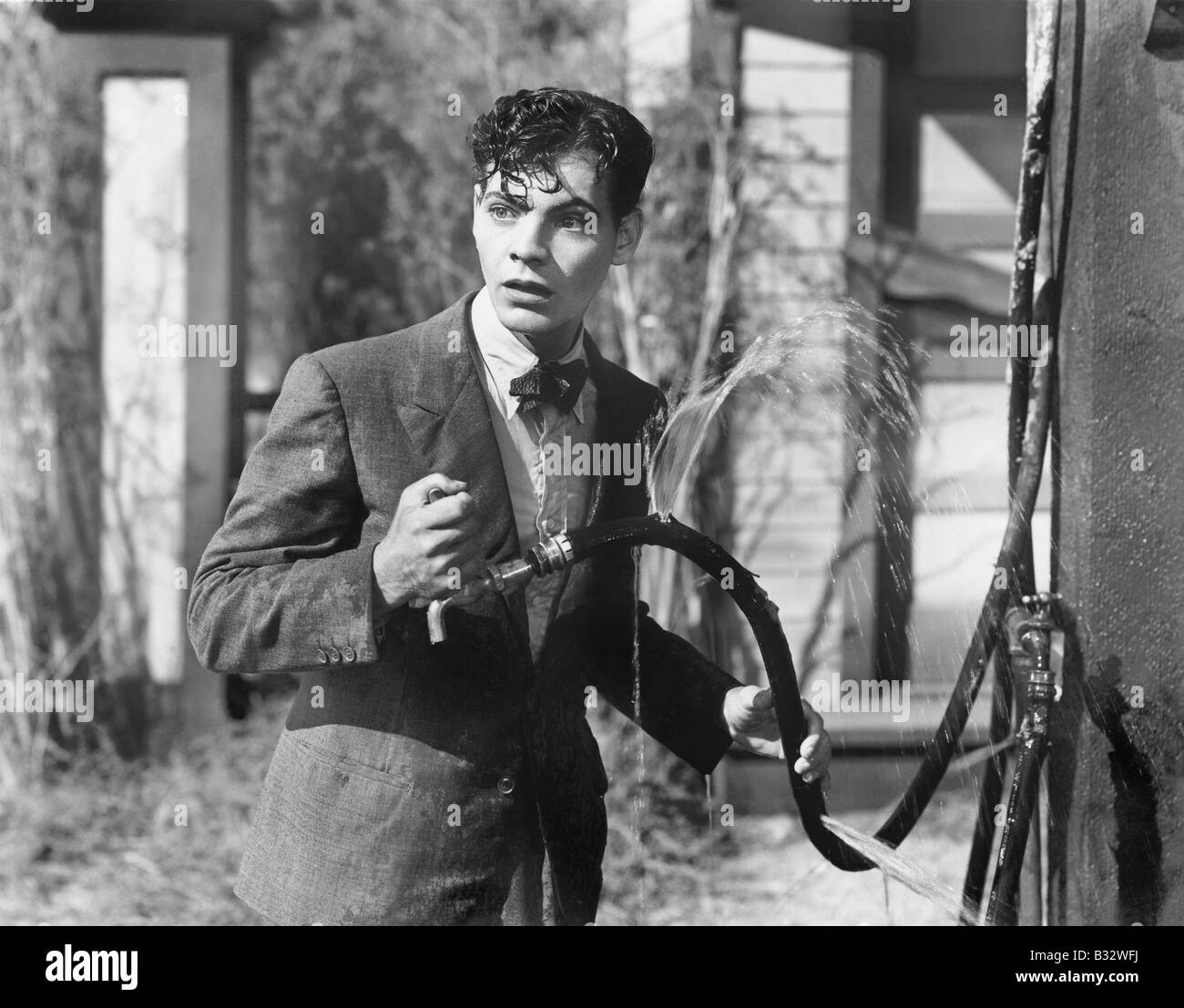 Getting wet Black and White Stock Photos & Images - Alamy