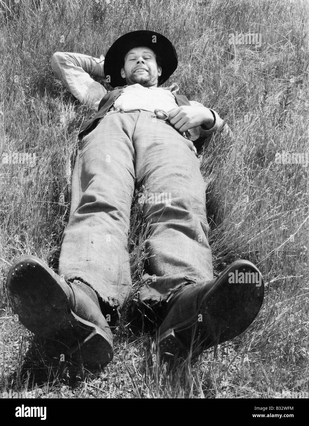 Happy man relaxing in Black and White Stock Photos & Images - Alamy