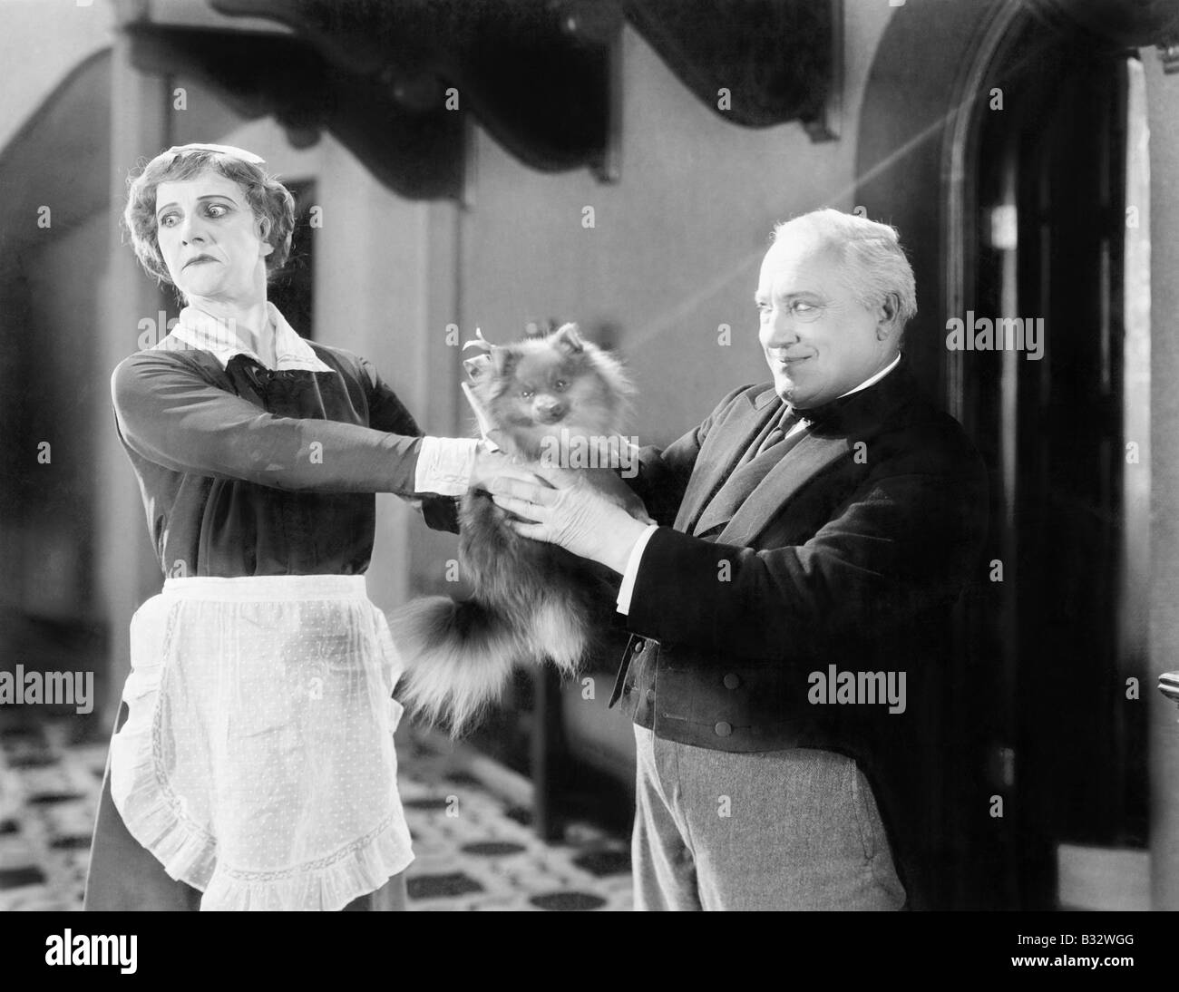 Woman pushing dog away hi-res stock photography and images - Alamy