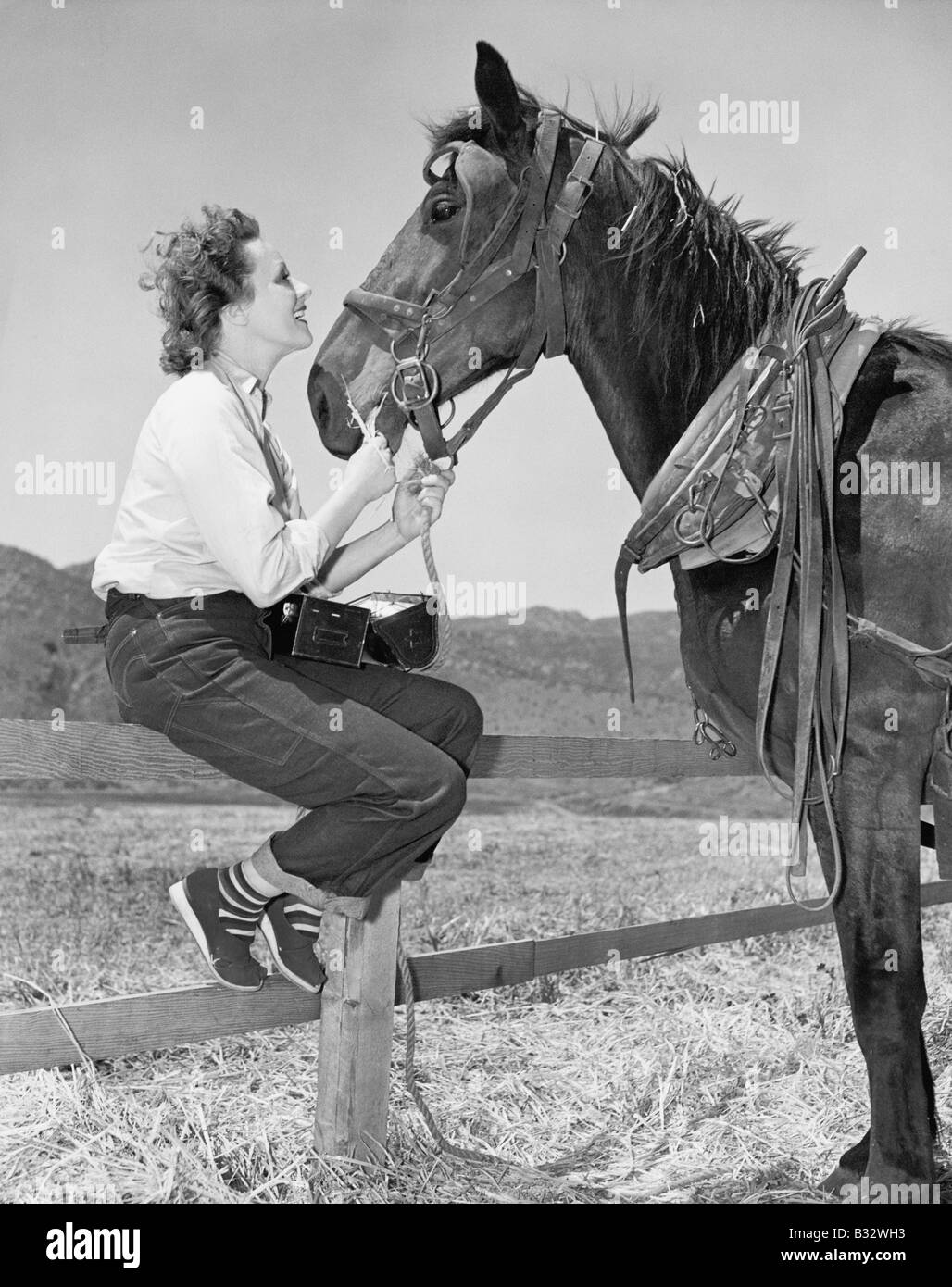 Young smiling woman blue Black and White Stock Photos & Images - Alamy