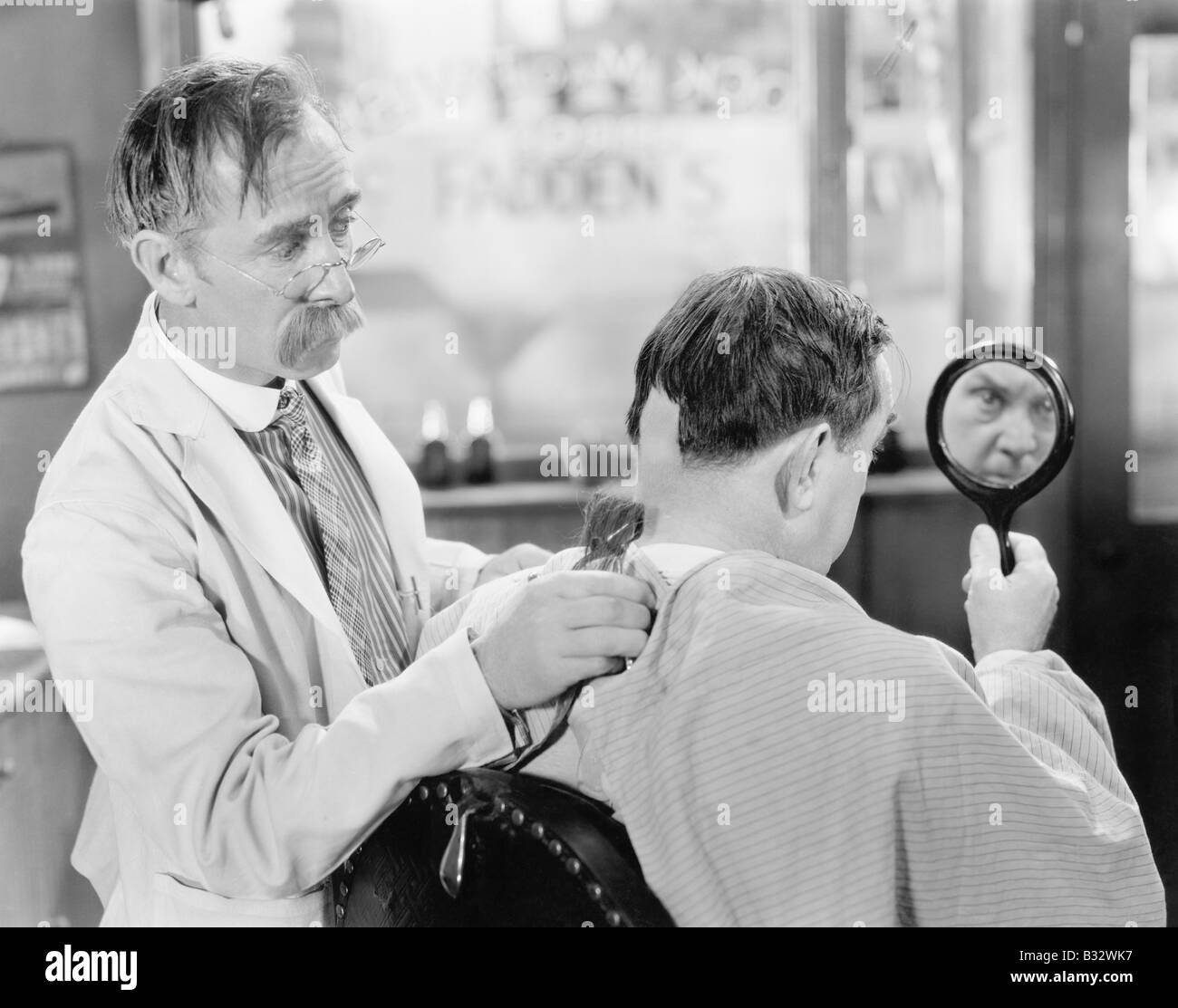 Barber shaving off too much hair Stock Photo - Alamy