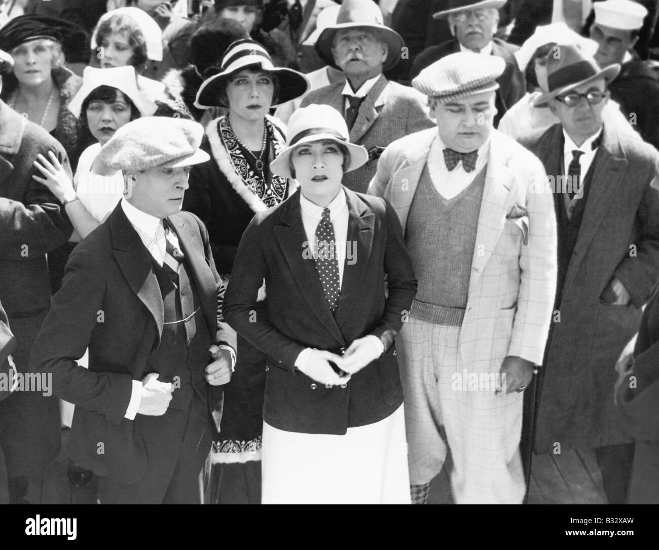 Group of people outside watching Stock Photo - Alamy