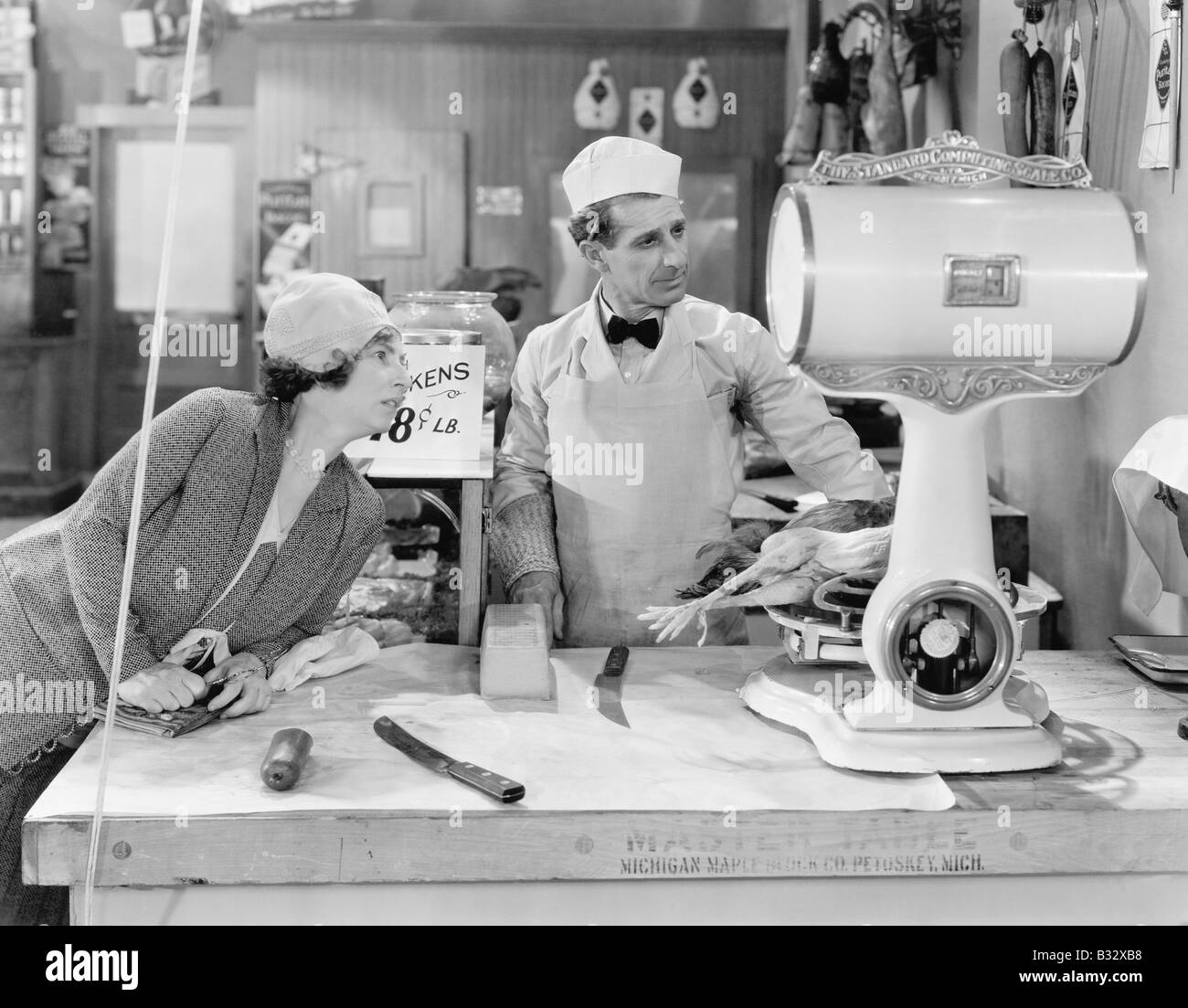Woman butcher shop Black and White Stock Photos & Images - Alamy