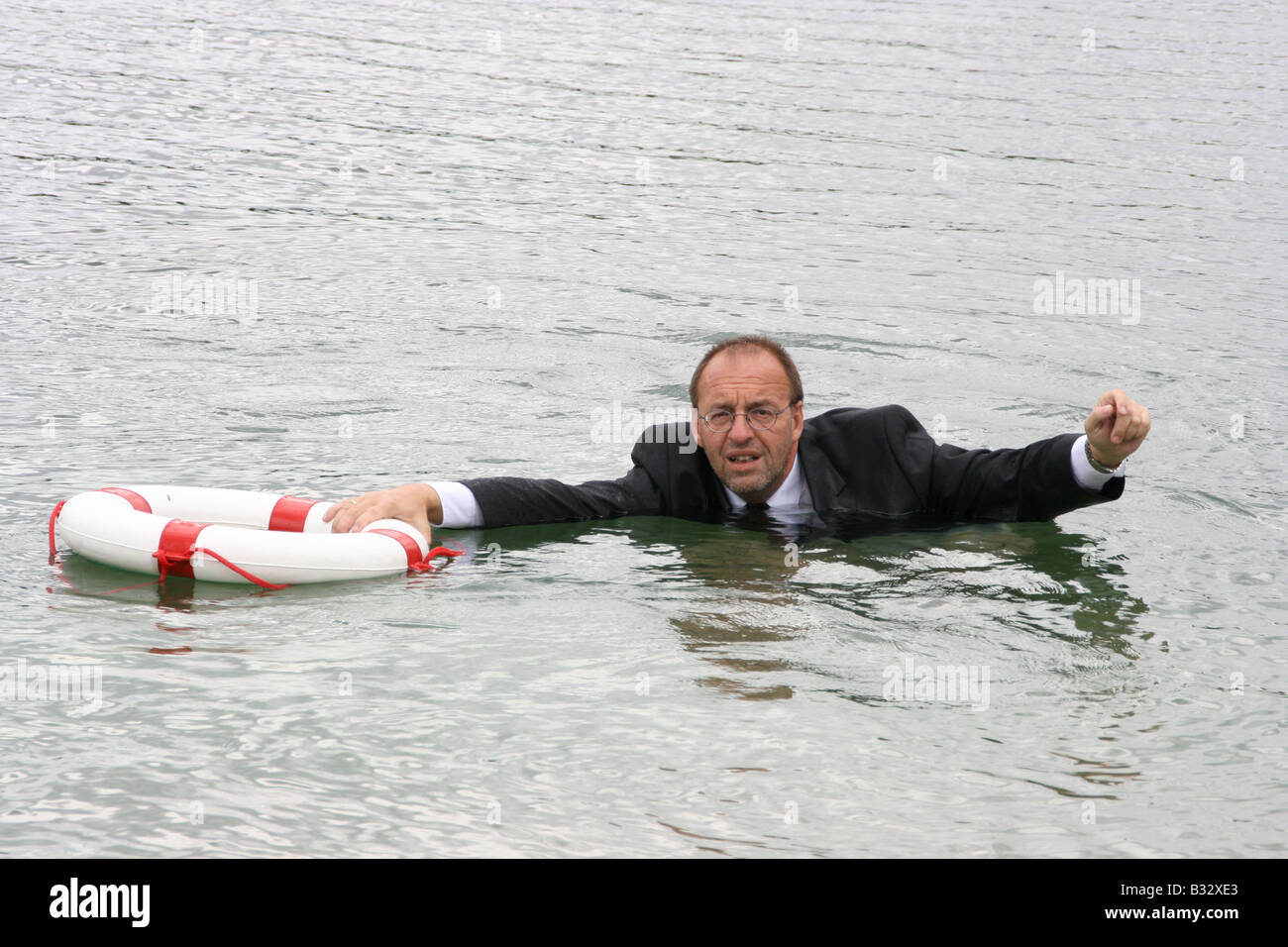 manager stands in deep water Stock Photo - Alamy