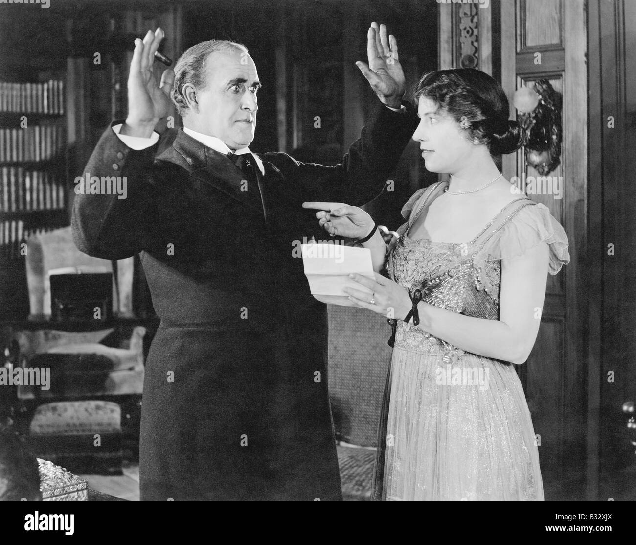 Hand in suit making Black and White Stock Photos & Images - Alamy