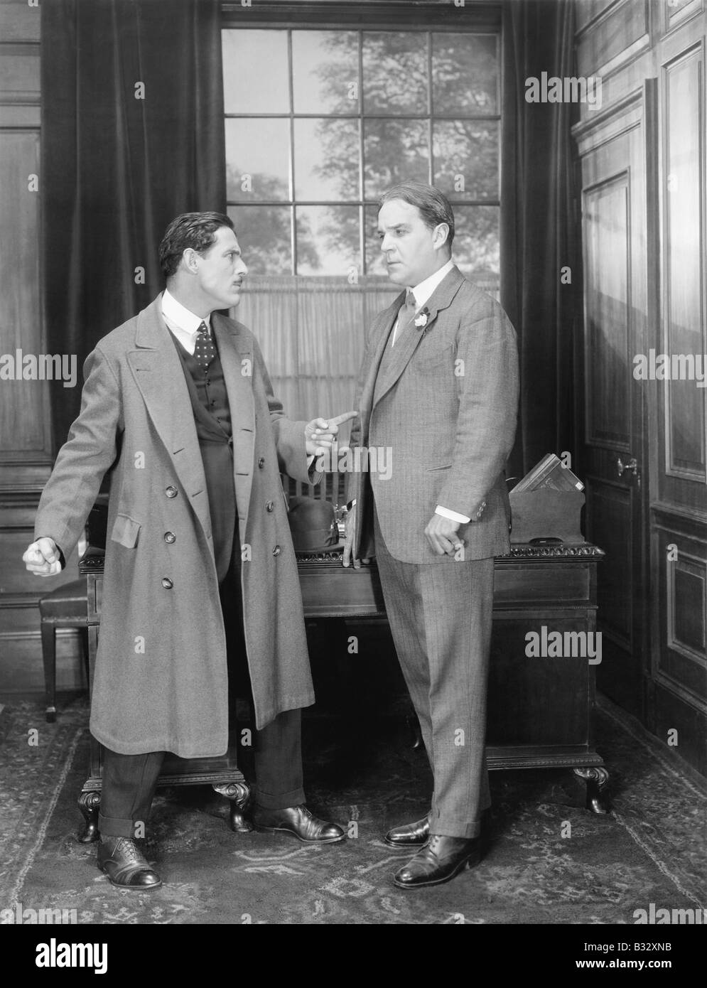 Two men fighting punching not boxing hi-res stock photography and ...