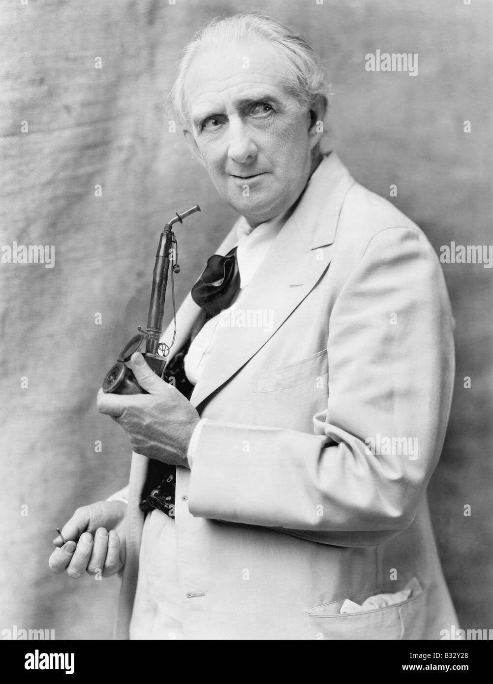 Portrait of a man with his pipe Stock Photo - Alamy