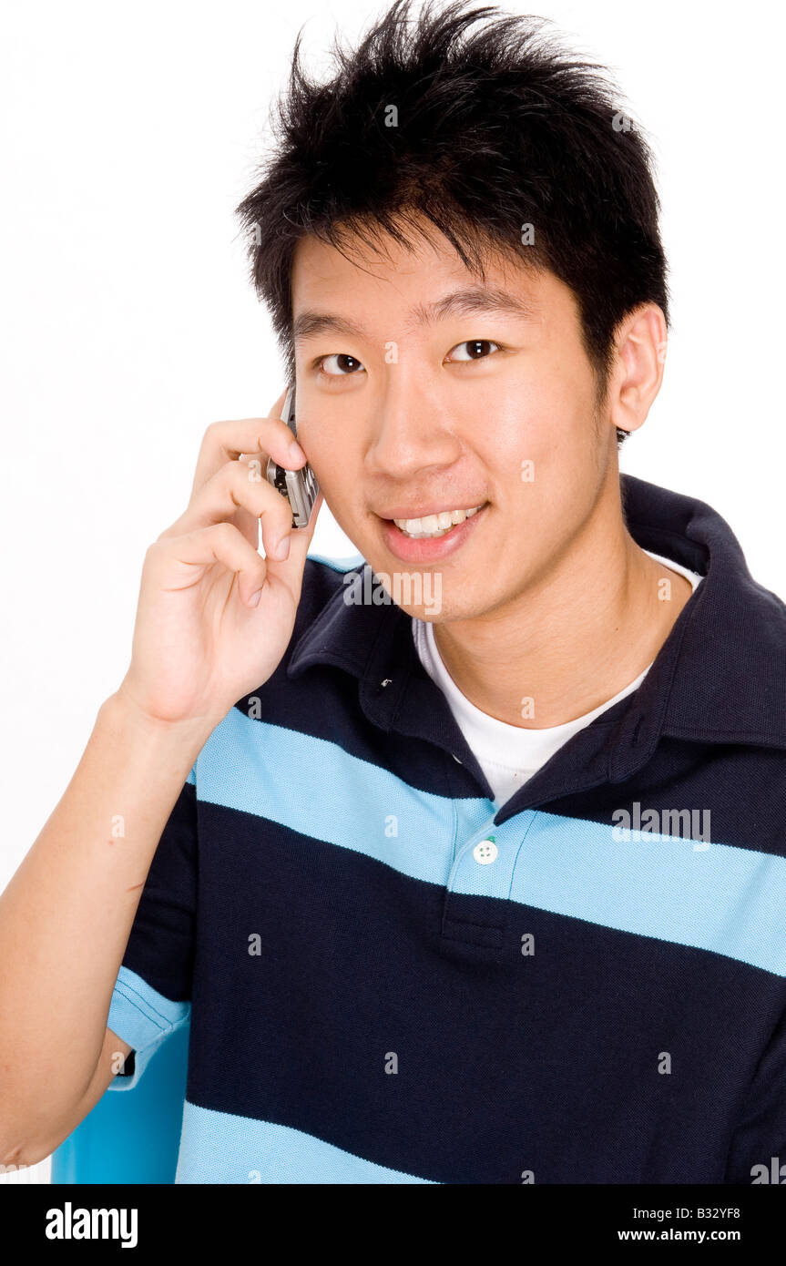A young chinese man using a phone Stock Photo - Alamy