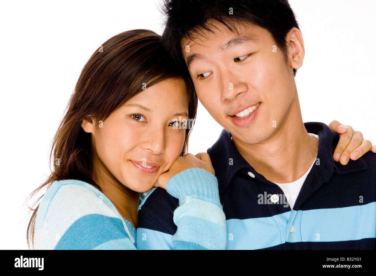 A young woman leaning on her man's shoulder Stock Photo - Alamy