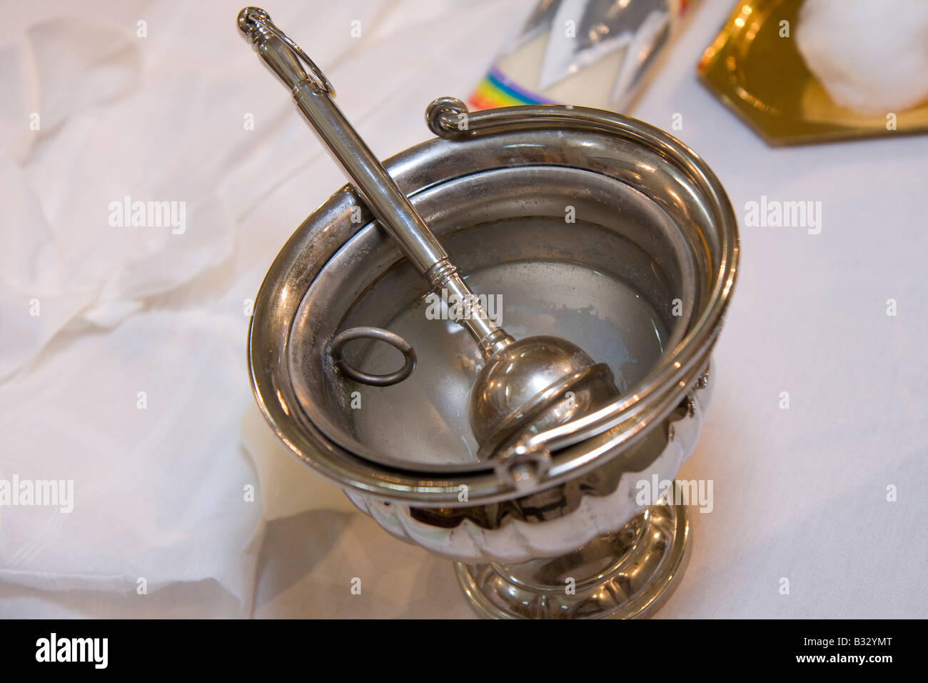 baptism utensils in church Stock Photo - Alamy