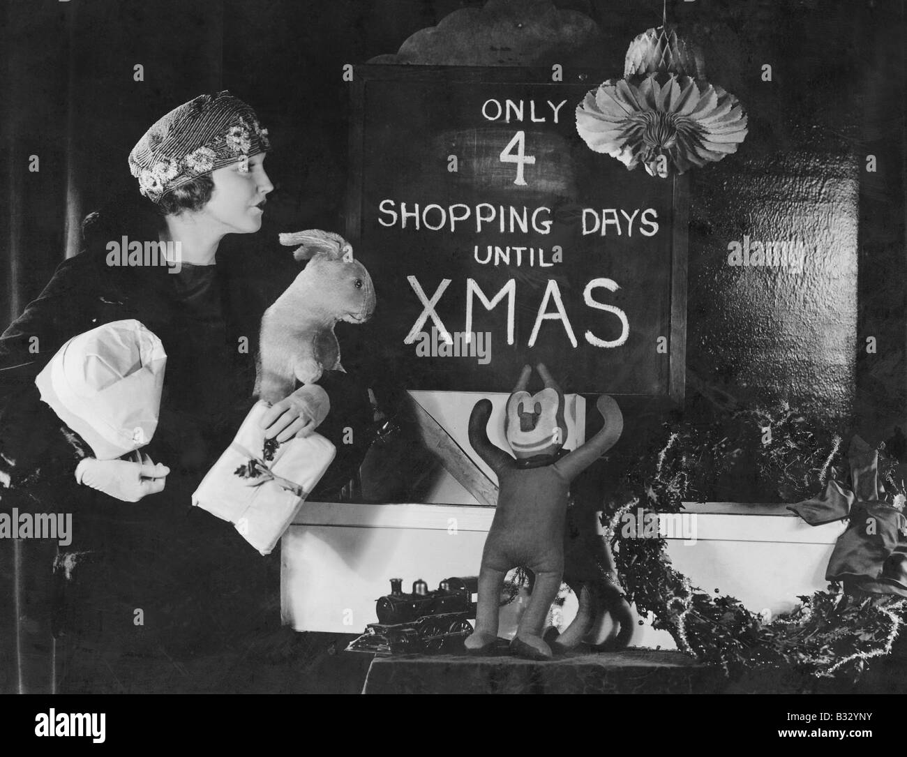 Woman reading sign with number of shopping days until Christmas Stock ...