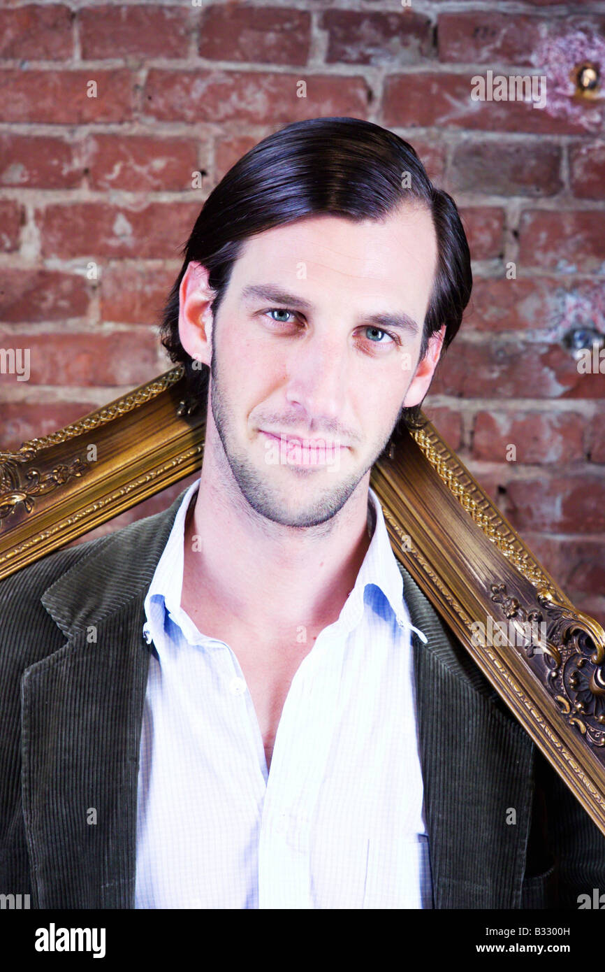 a young man in a picture frame Stock Photo - Alamy