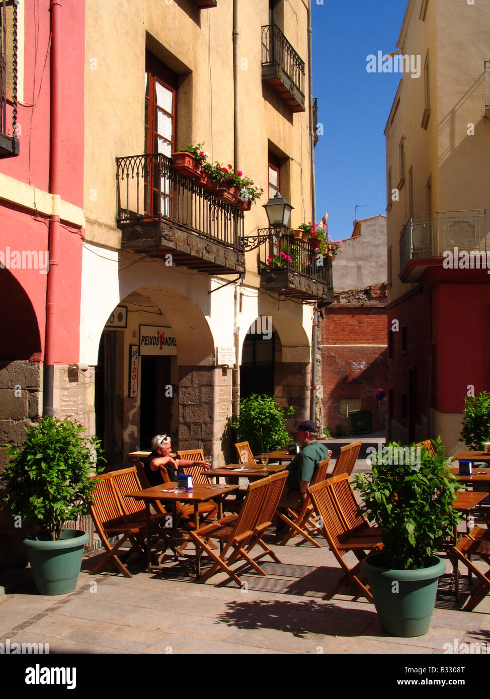 Spain, Costa Brava, Castello d'Empuries, old town, street cafe Stock ...