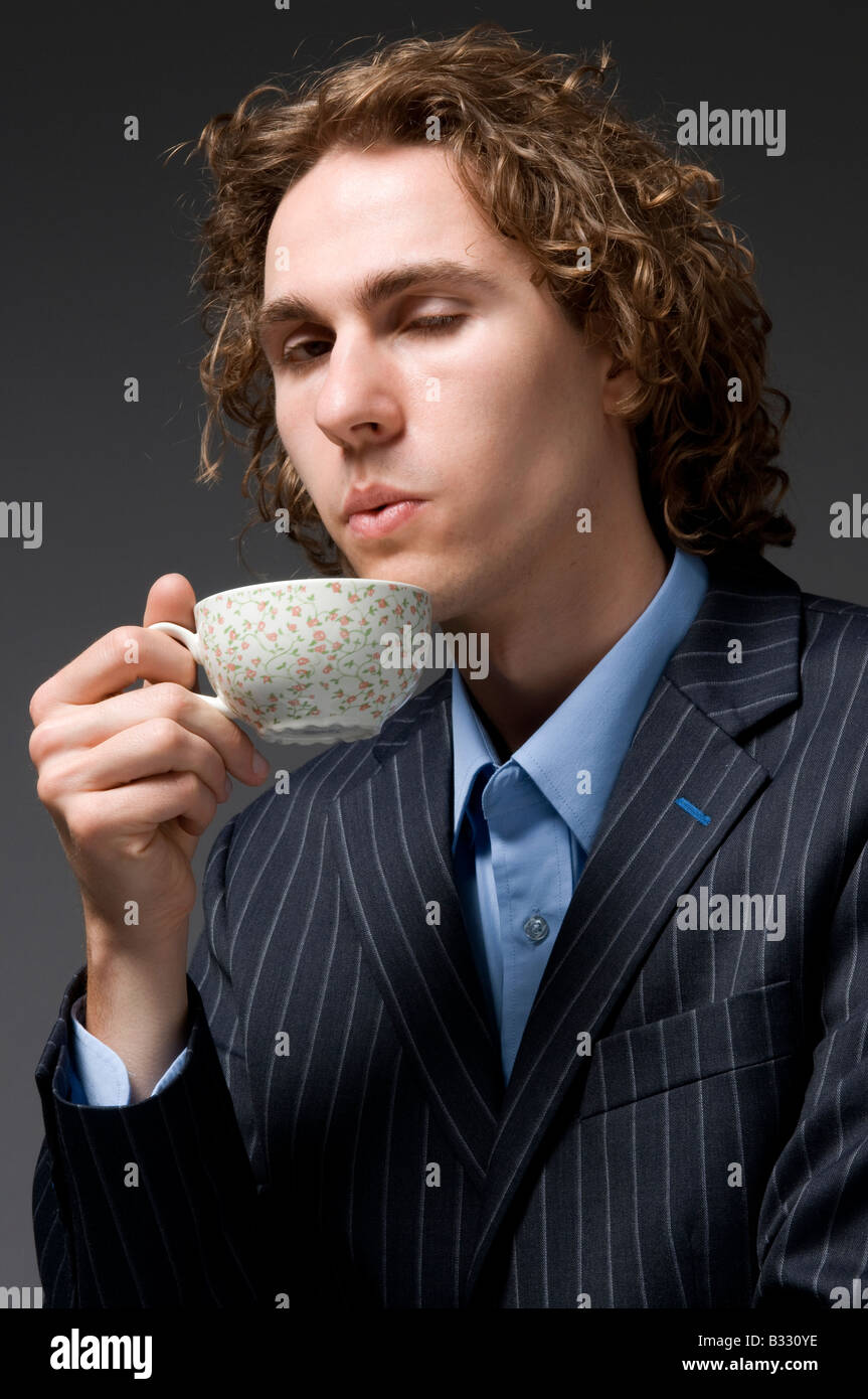 Man with a cup of coffee Stock Photo - Alamy