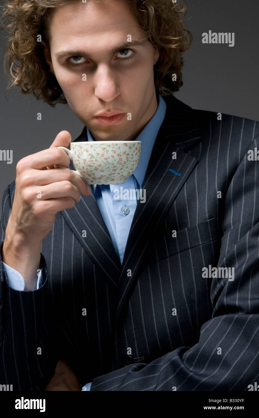 Man with a cup of coffee Stock Photo - Alamy