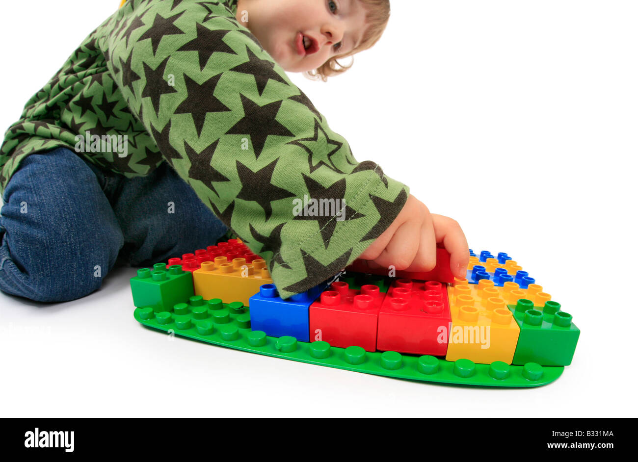 little boy playing with Lego bricks Stock Photo - Alamy