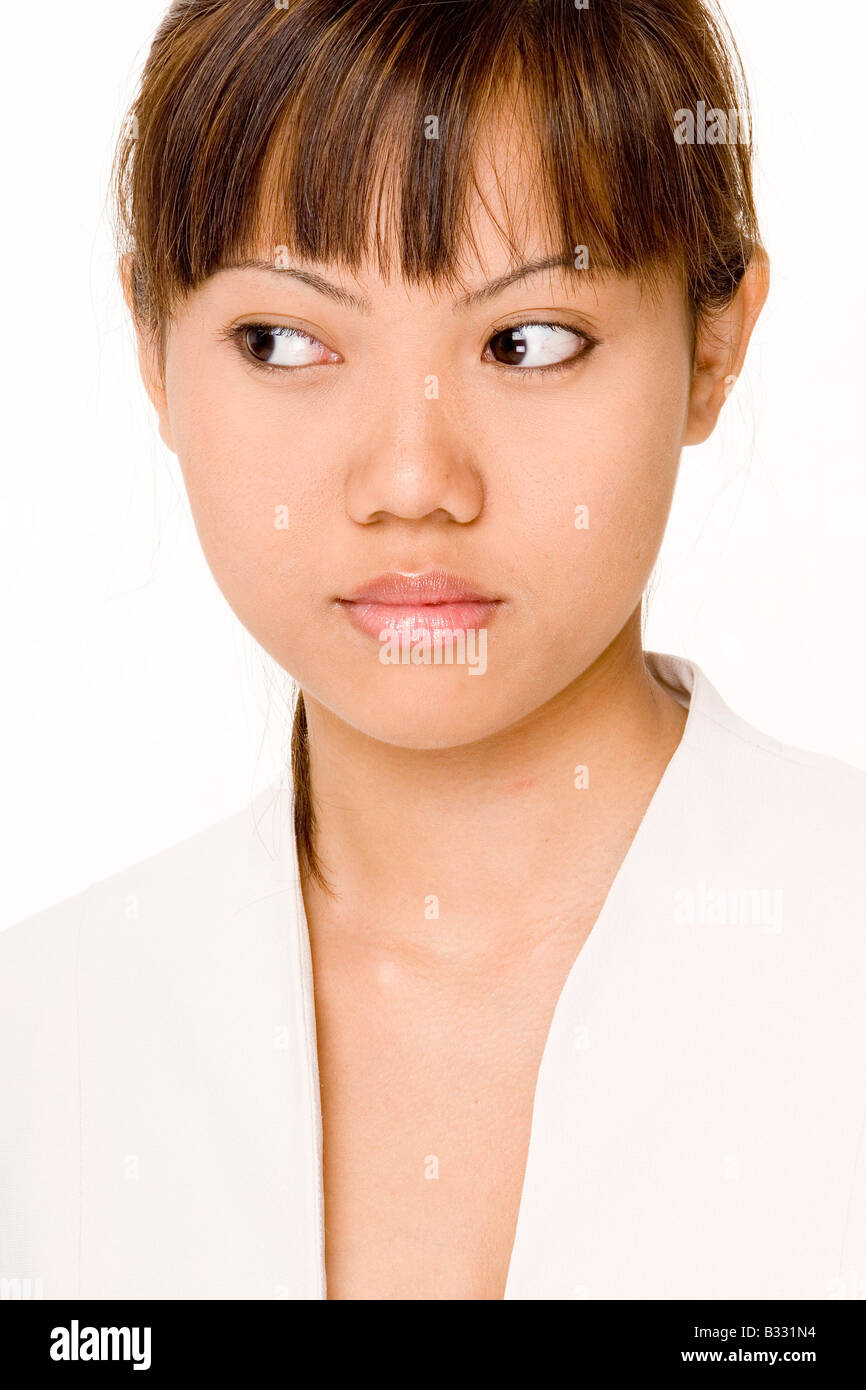 A pretty asian woman looks to one side Stock Photo - Alamy