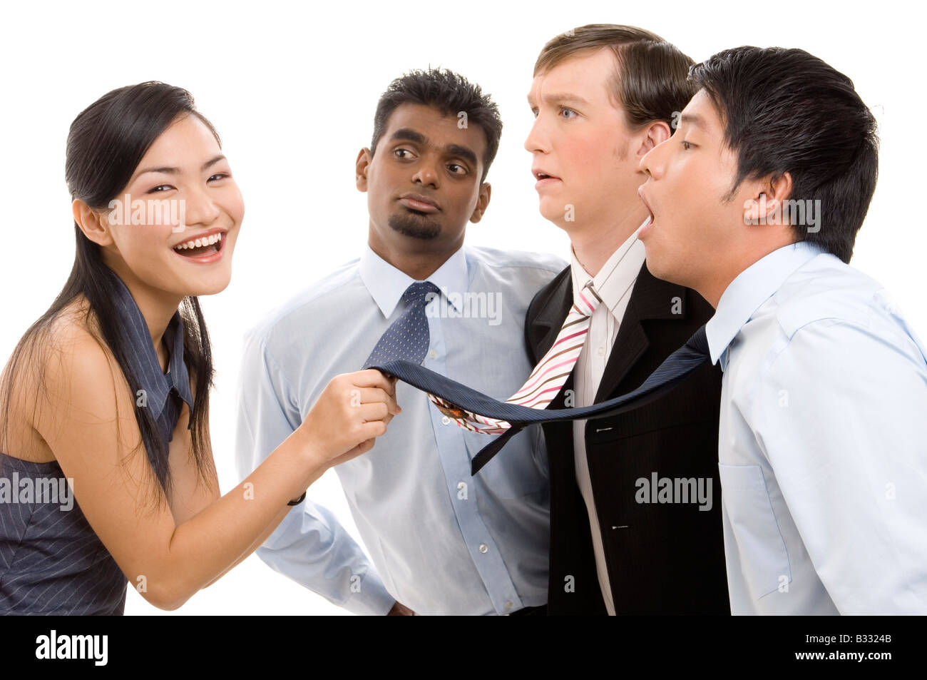 A laughing chinese businesswoman has three of her colleagues exactly ...