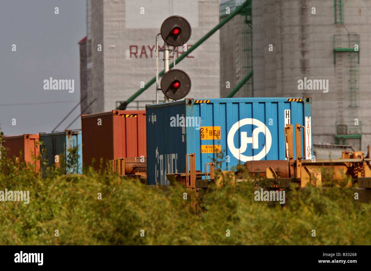 Container rail cars passing through Raymore Saskatchewan Stock Photo ...
