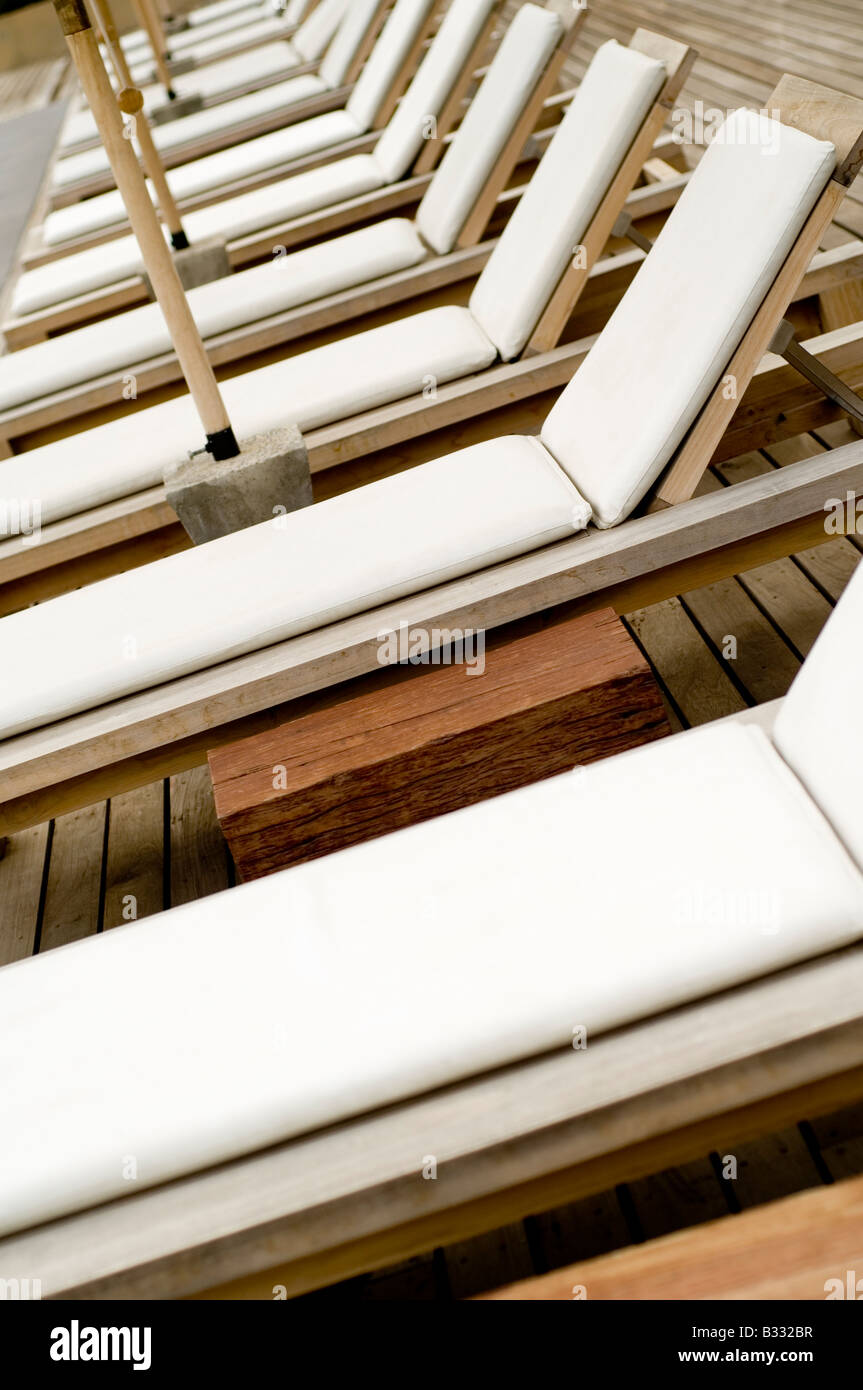 Line wooden sun beds hi-res stock photography and images - Alamy