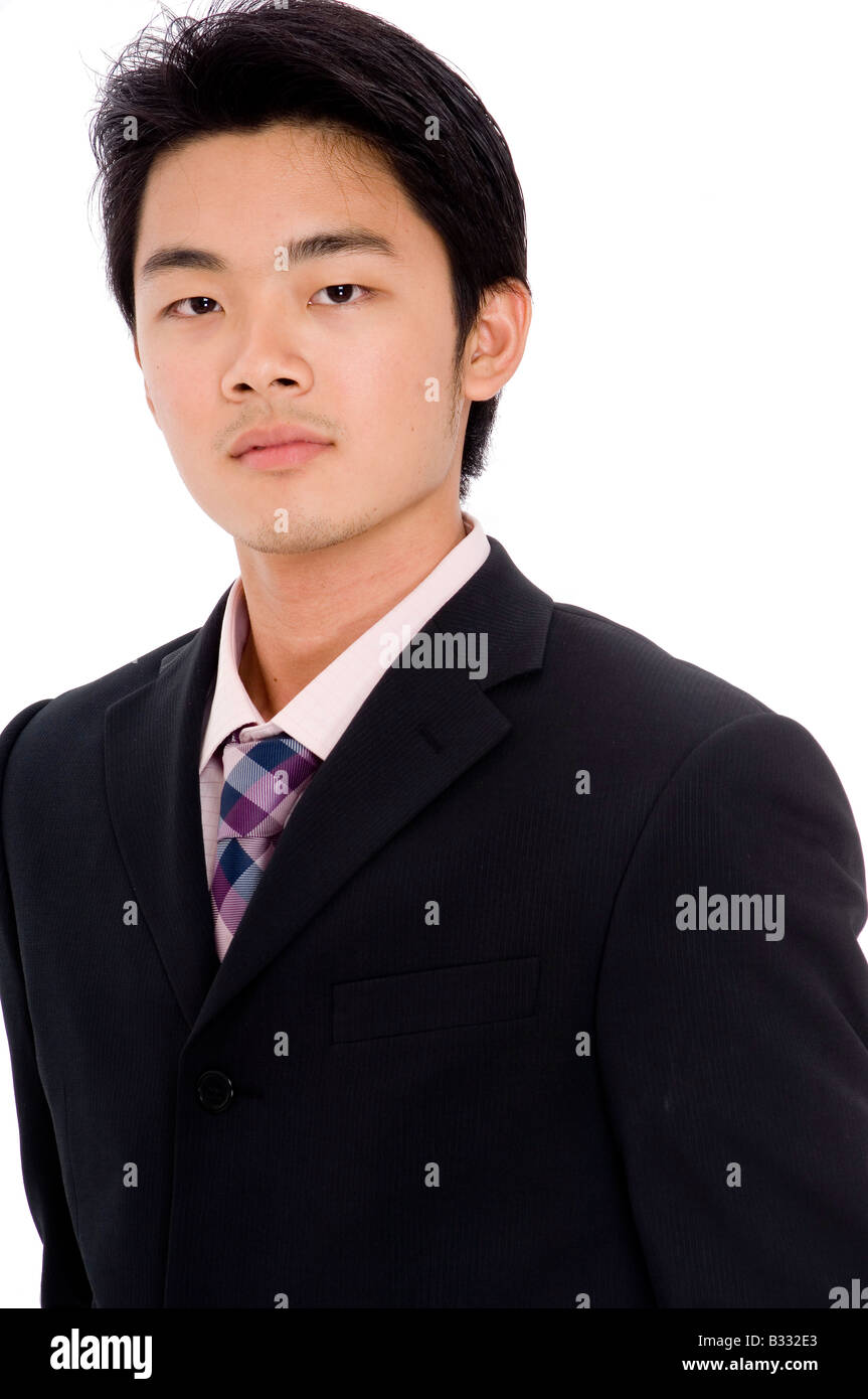 A young smart asian businessman in a suit Stock Photo - Alamy
