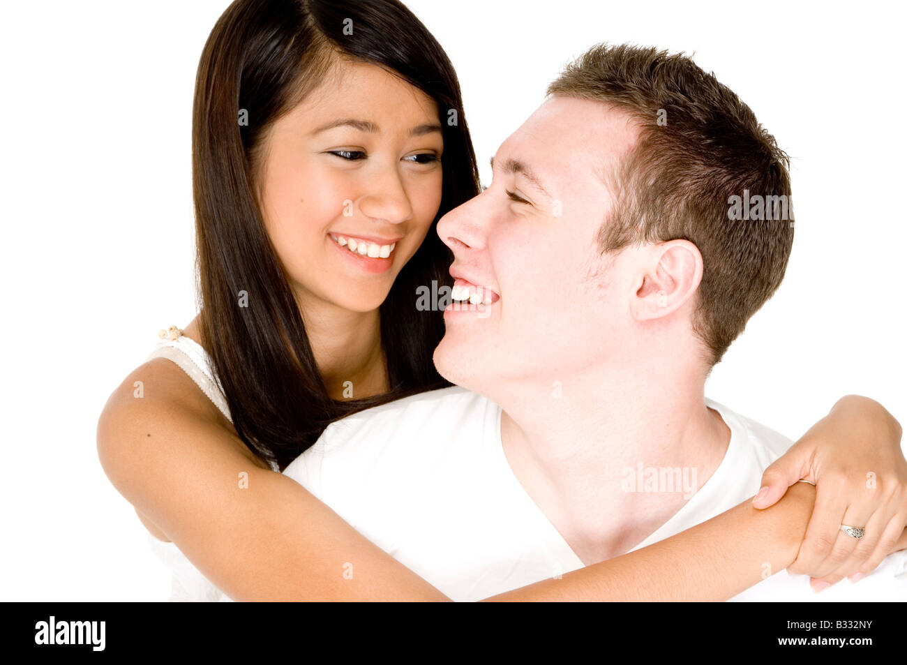 Couple embrace looking others eyes hi-res stock photography and images ...