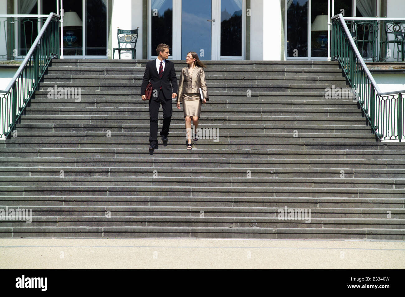 Businessman going down stairs hi-res stock photography and images - Alamy