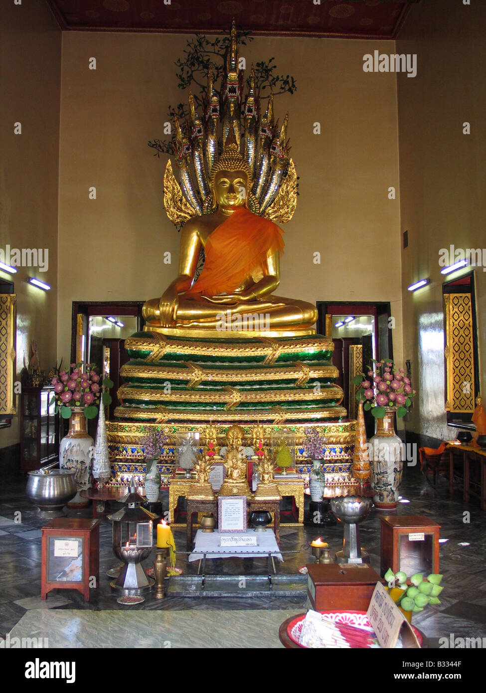 Asia, Thailand, Bangkok, Buddhistic temple, Wat Pho, Buddha meditating with rolled up snake ...