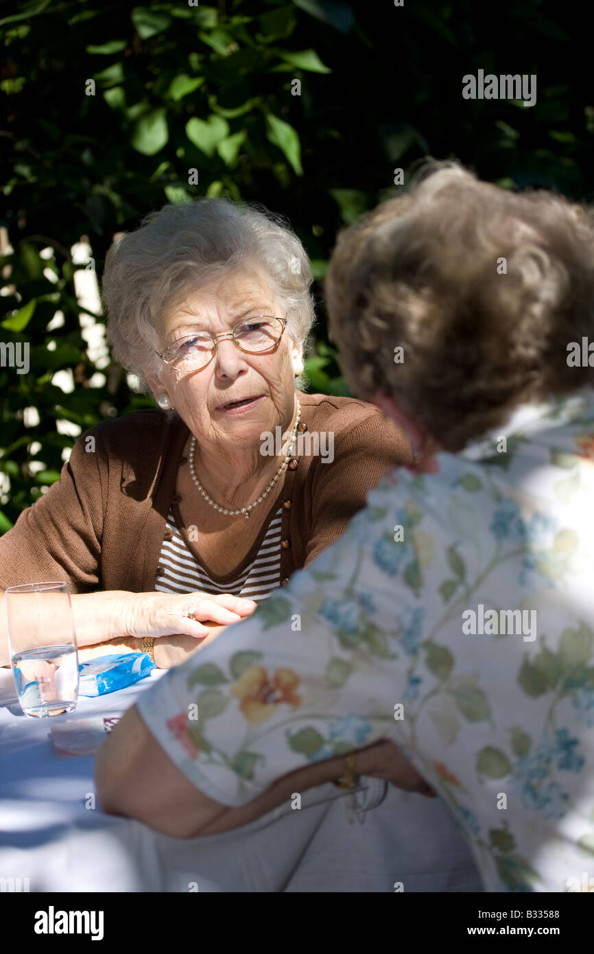 two old women talking Stock Photo - Alamy