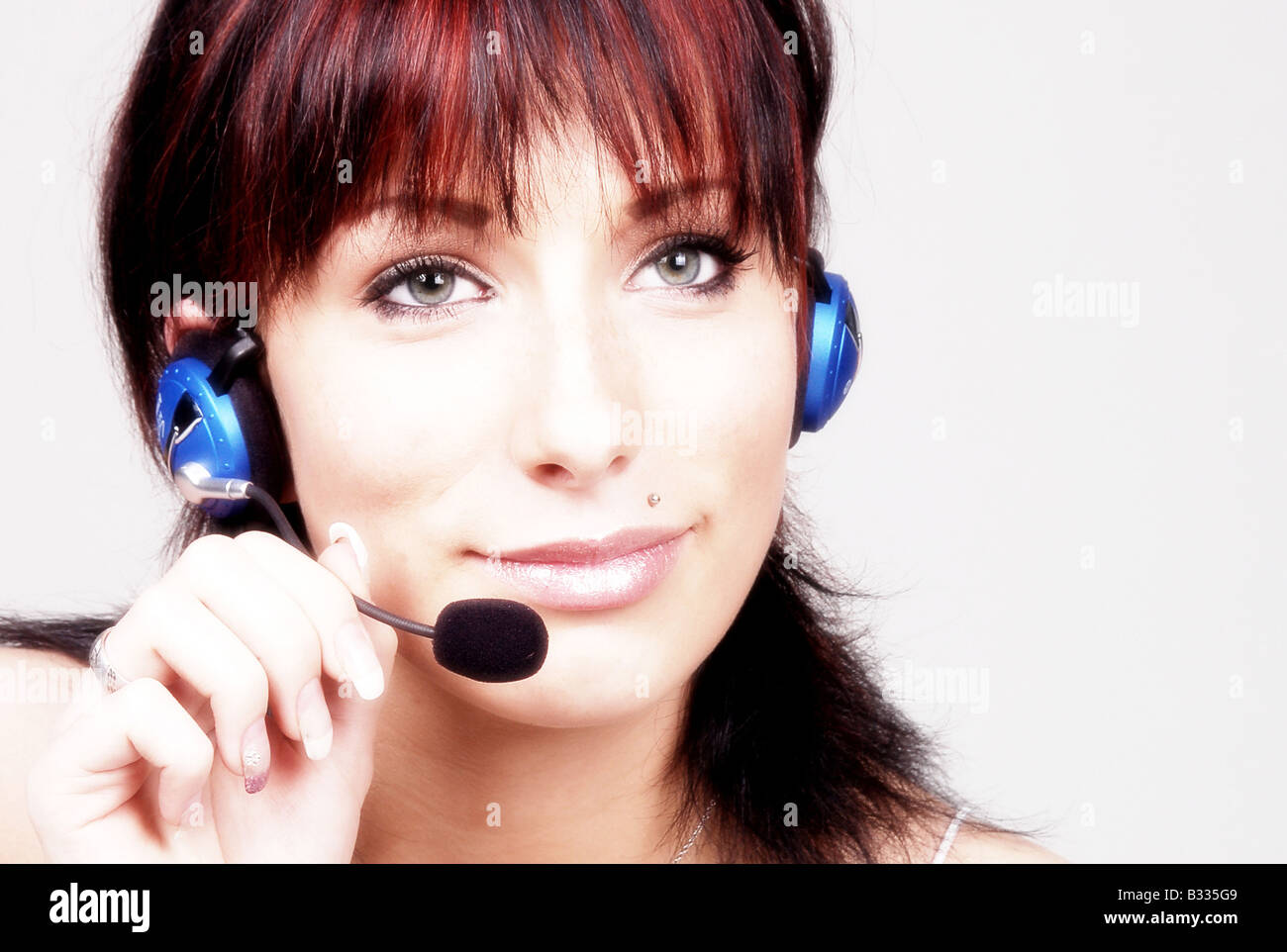 lady with a headset Stock Photo - Alamy