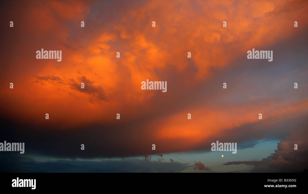 clouds and moon at sunset Stock Photo - Alamy