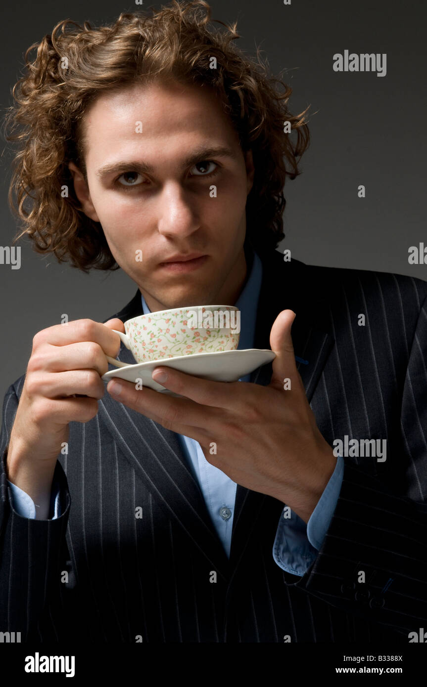 Man with a cup of coffee Stock Photo - Alamy