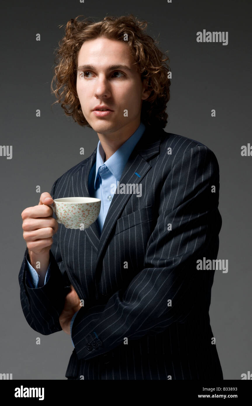 Man with a cup of coffee Stock Photo - Alamy
