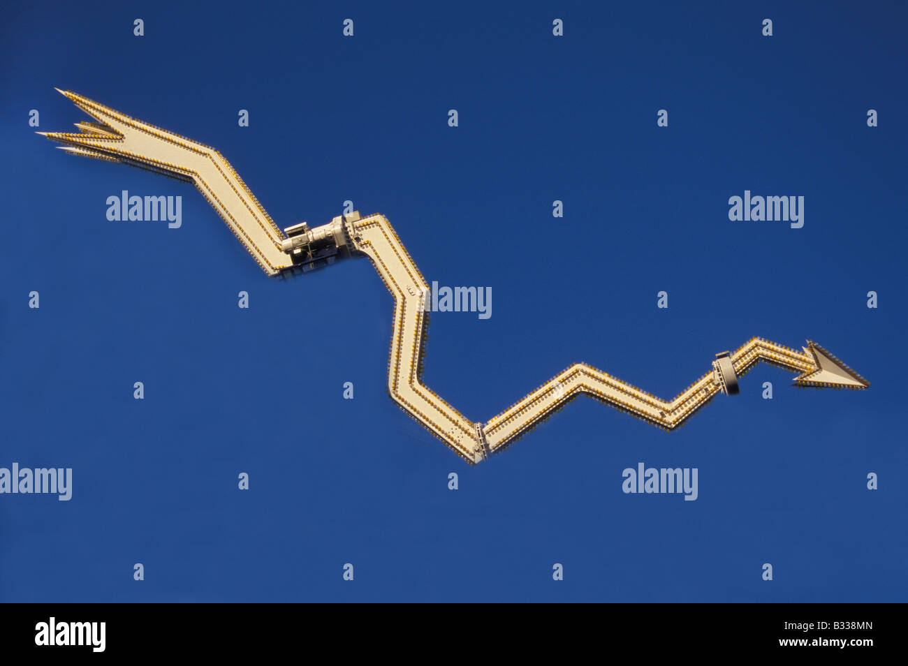 Lightning arrow downward going symbol Stock Photo - Alamy