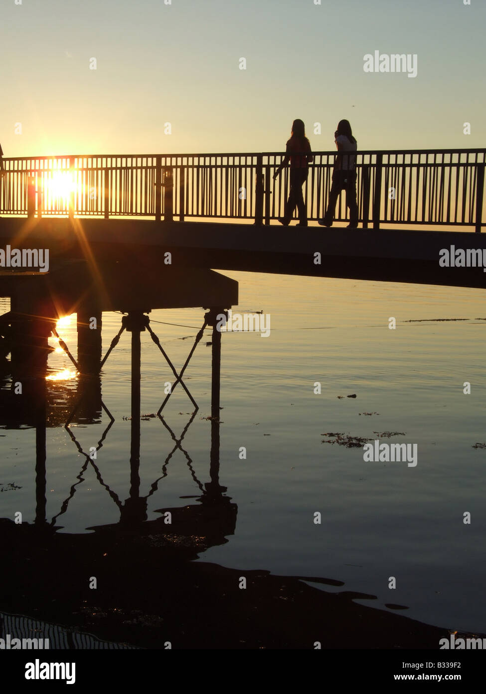 Woman two children crossing hi-res stock photography and images - Alamy