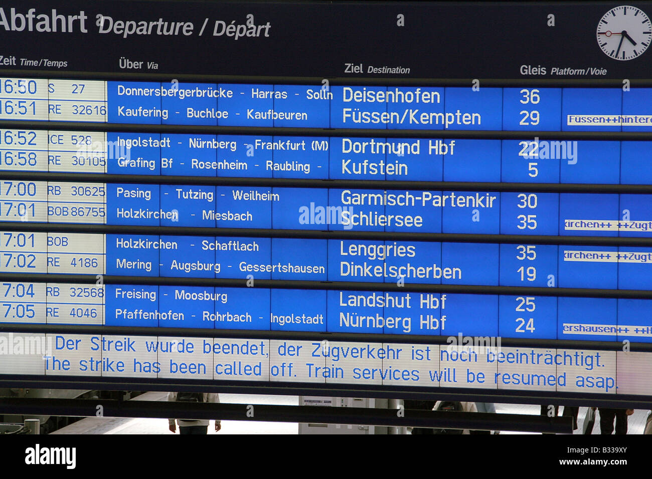 Munich main station, and of strike on timetable board Stock Photo - Alamy