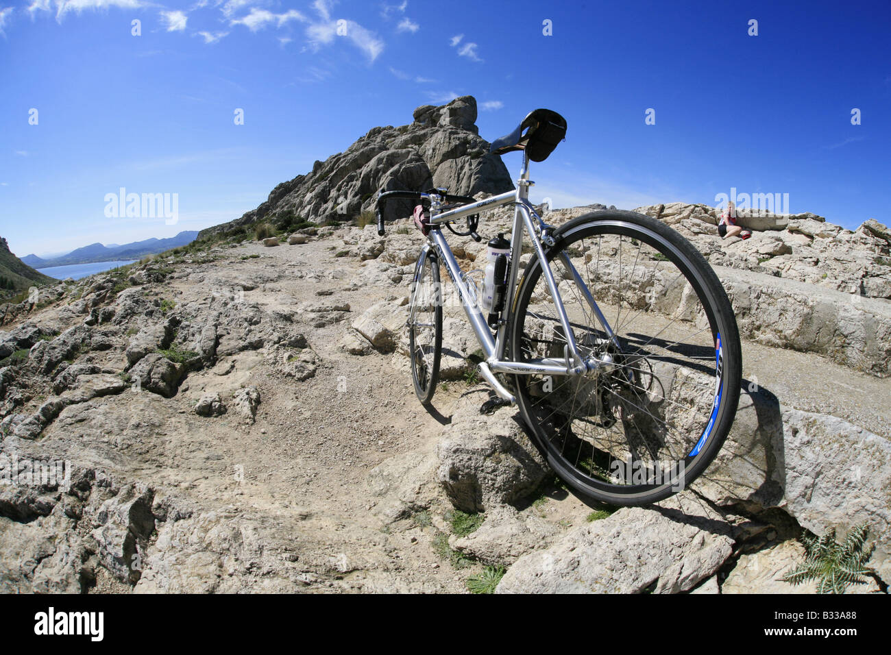 bicycle and resting biker Stock Photo - Alamy