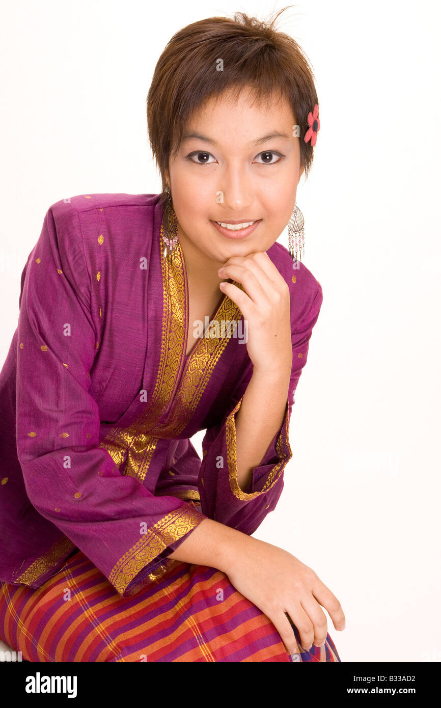 A pretty young asian girl in traditional clothing Stock Photo - Alamy