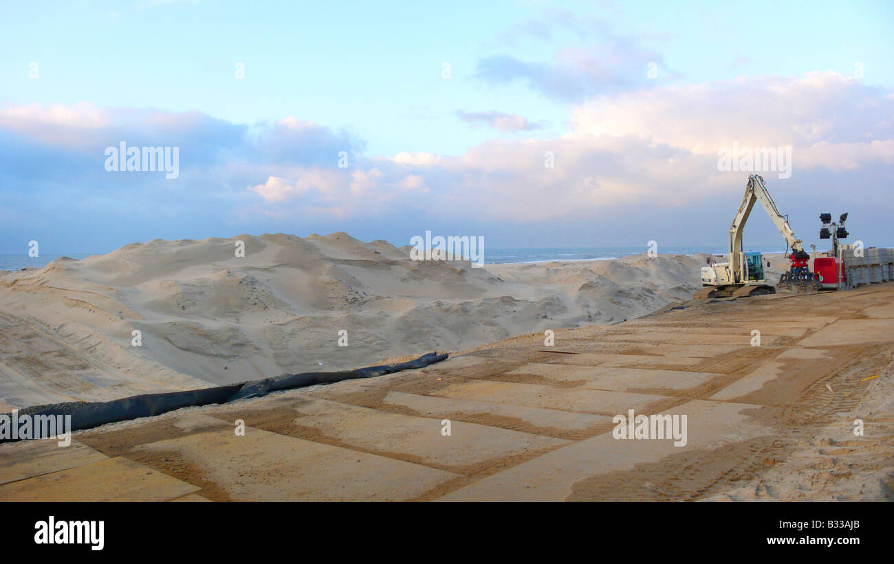 Dike construction for amplifying the coast hi-res stock photography and ...