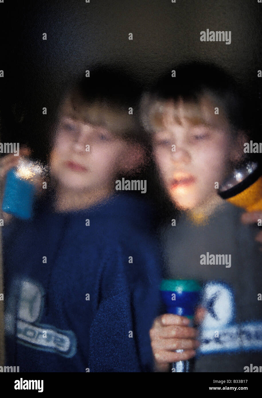 Children with torch hi-res stock photography and images - Alamy