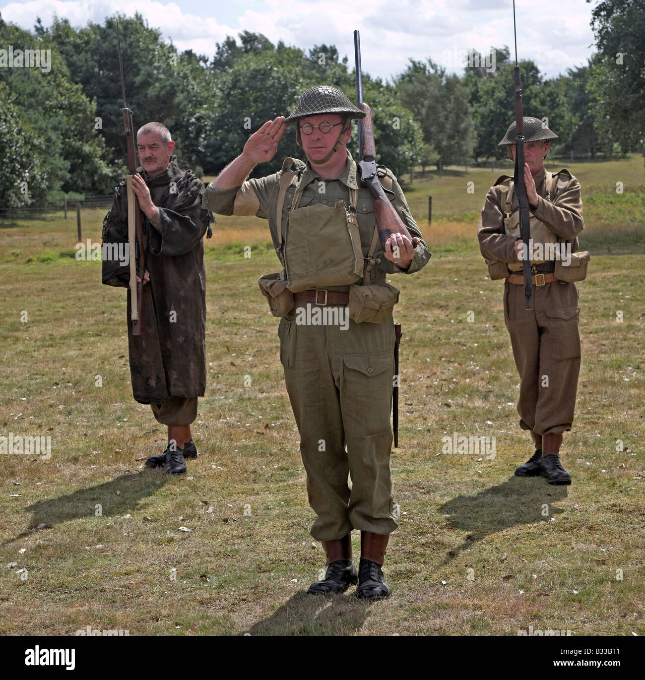 Home Guard soldiers stand to attention on parade at camp during 1940s ...